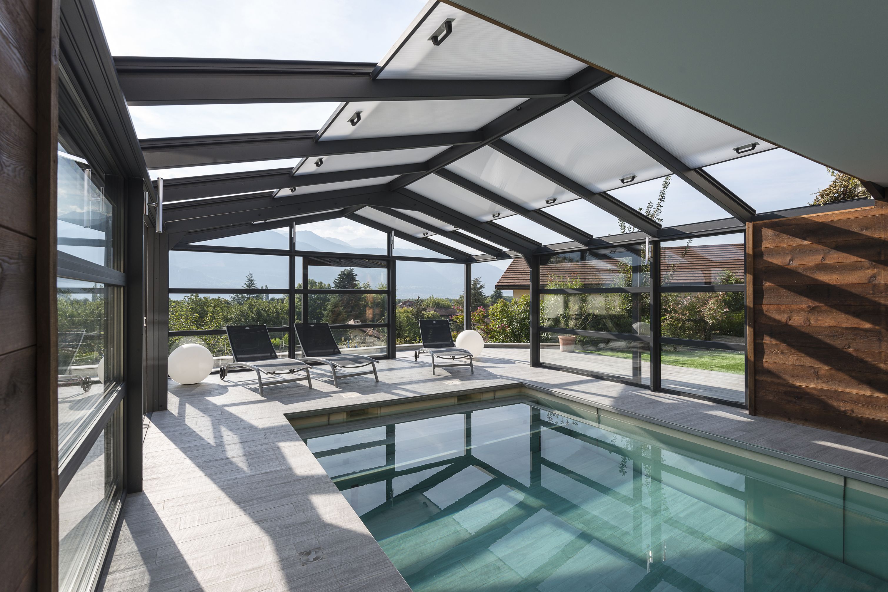 Véranda pour piscine avec toit ouvrant en polycarbonate | Cover Concept